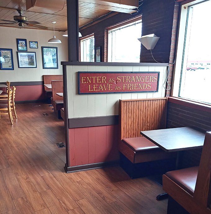 "Enter as Strangers, Leave as Friends"&mdash;a sign that perfectly captures the warm, unpretentious spirit of this chicken institution.
