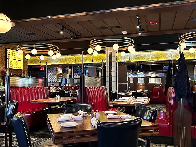 The dining area balances retro charm with modern comfort, like your coolest aunt's living room if she also happened to be a fantastic chef.