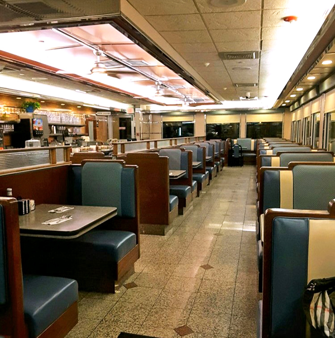 The diner's dining room&mdash;where strangers become neighbors. Empty now, but soon these booths will witness first dates, family reunions, and business deals.