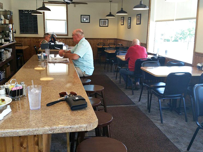 The counter and dining area &ndash; where strangers become temporary neighbors, united by the universal language of "pass the syrup, please."