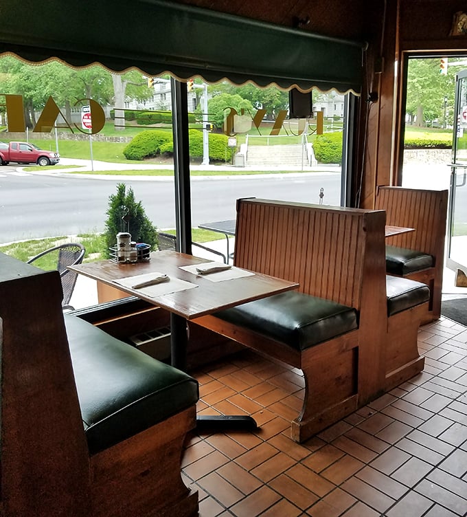Window seats that let you watch the world go by while you contemplate ordering seconds. The booths invite you to settle in and stay awhile.