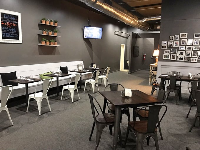 Modern industrial meets cozy gathering spot, where empty tables won't stay that way for long.