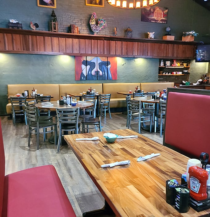 The dining area features cheerful colors and plenty of space, creating an atmosphere where lingering over coffee feels practically mandatory.