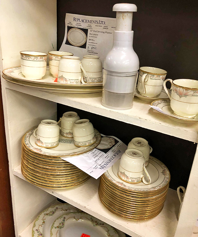 Fine china waits patiently for its next dinner party, delicate patterns promising to elevate even your boxed mac and cheese to elegant status.