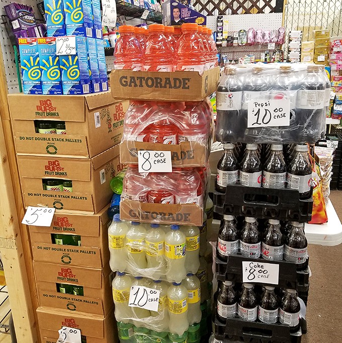 Hydration station! Cases of Gatorade and soda stand like colorful skyscrapers, ready to quench thirsts at prices that won't drain wallets.