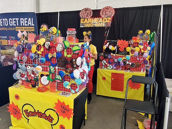 The "Earheadz" booth brings whimsical handcrafted creations that look like they escaped from a Pixar movie about toys with big personalities.