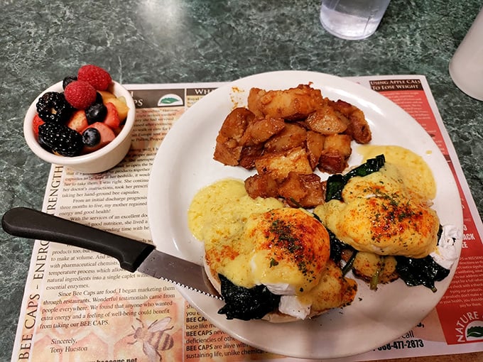 Breakfast meets artistry&mdash;golden potatoes, perfectly cooked eggs, and a side of fresh fruit create a plate that's almost too pretty to eat. Almost.