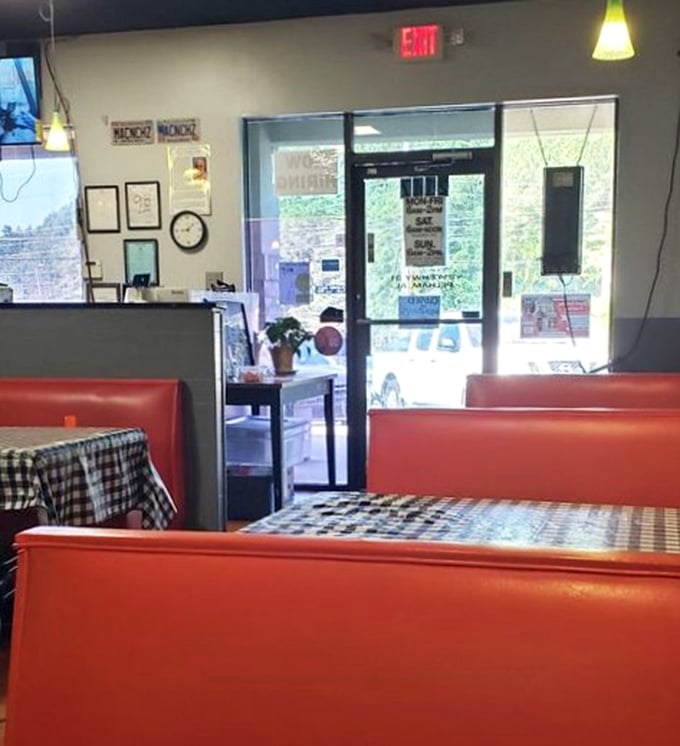 The view from inside reveals bright windows and those signature red booths&mdash;a diner tableau that feels like coming home, even for first-timers.