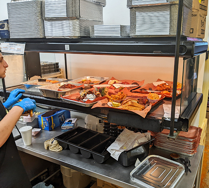 Behind the scenes where barbecue magic happens. Like Willy Wonka's factory, but with more meat and fewer questionable labor practices.