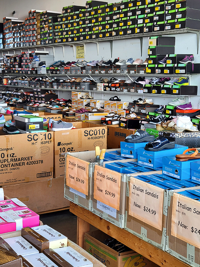 Shoe paradise! With enough footwear to outfit a small army of fashionable Floridians, this vendor's collection proves that happiness might actually be just a new pair of sandals away.