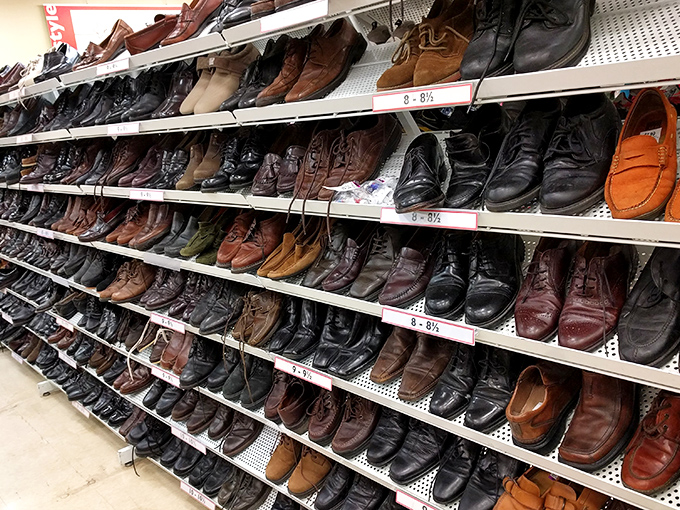 The men's shoe section: a leather landscape of possibility. These boots and loafers once walked interesting paths&mdash;now they await your next adventure.