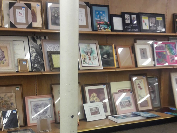 A gallery wall of second-chance art, where someone's discarded decor becomes your living room's new conversation piece.