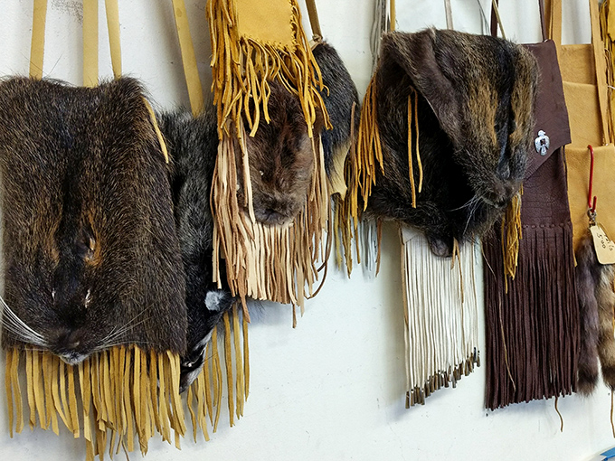 Handcrafted leather and fur bags hang like trophies from a bygone era. Part frontier chic, part conversation starter for your next dinner party.