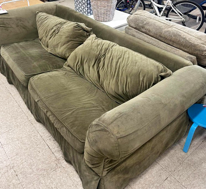 This olive sectional has stories to tell, just waiting for a new living room to call home and new conversations to witness.