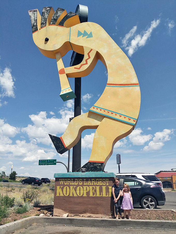 "Stand right there—perfect!" Childhood memories in the making, with a dash of Southwestern mythology thrown in for educational credit.