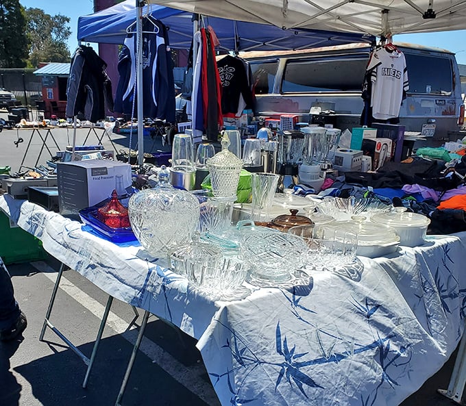 Grandma's china cabinet meets modern treasure hunt. These crystal pieces await their second act in someone's dinner party spotlight.