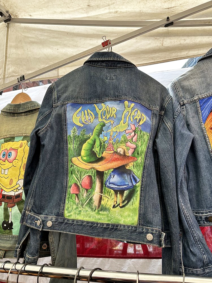 Wearable art that turns your back into a conversation piece. Alice in Wonderland meets denim in a psychedelic tea party.