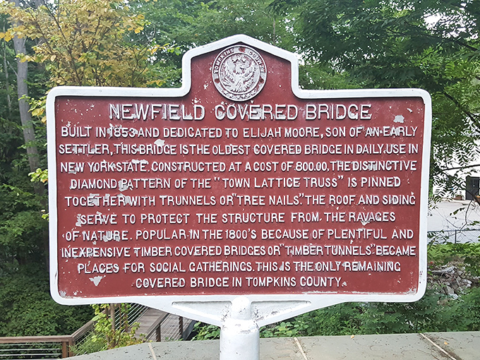 This historical marker tells the bridge's origin story better than any superhero movie. Built in 1853, it's the oldest covered bridge still in daily use in New York.