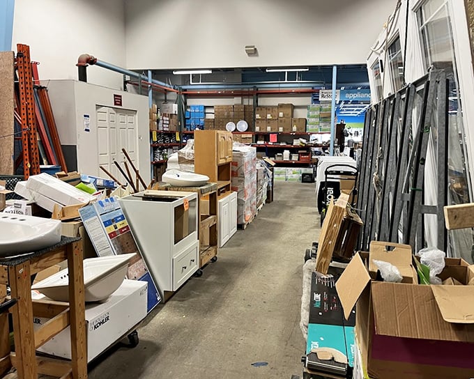 Building materials, sinks, and doors line the aisles like a contractor's fever dream come true magnificently. 