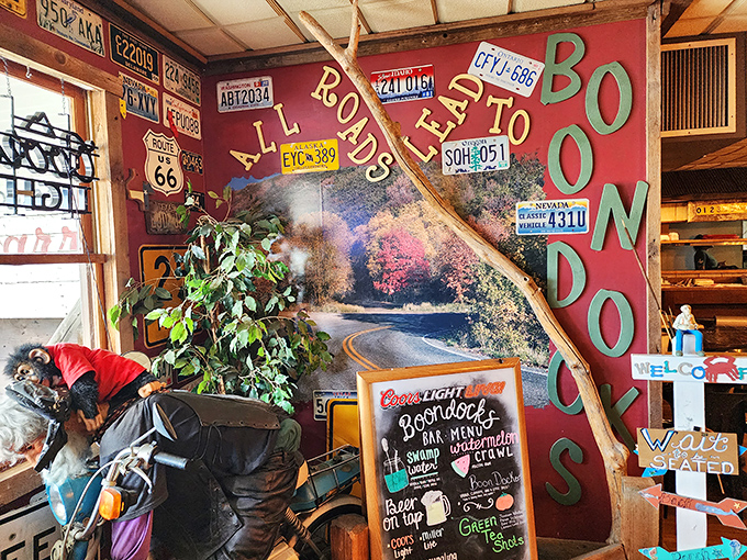 The "All Roads Lead to Boondocks" wall isn't just decoration—it's the local philosophy in license plate form.