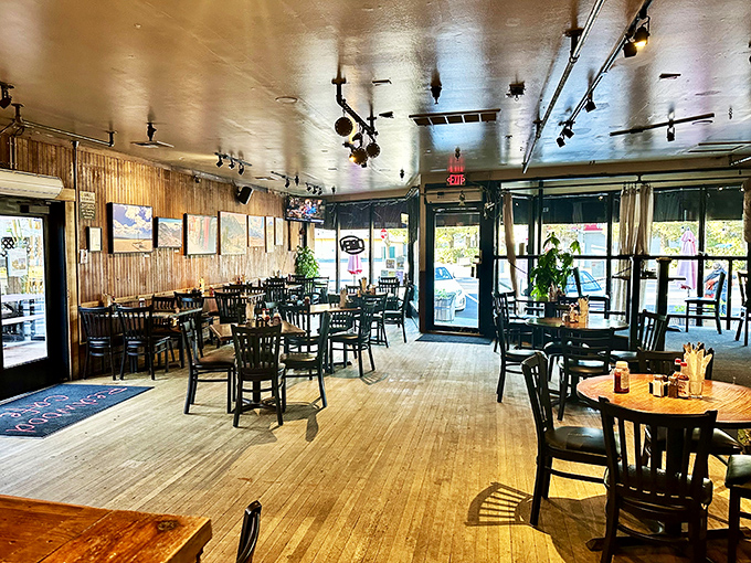 An interior designed for both intimate conversations and people-watching, with enough space to breathe but close enough to feel the community vibe.