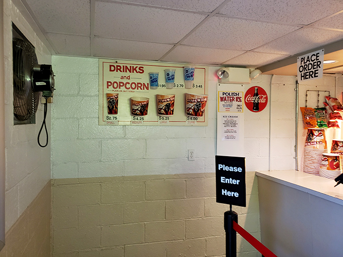 The concession stand menu&mdash;where movie theater economics has always lived. Popcorn: the time-honored fuel of cinema appreciation.