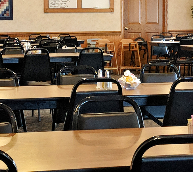 Simple tables, sturdy chairs, and zero pretense&mdash;exactly how a proper breakfast spot should look.