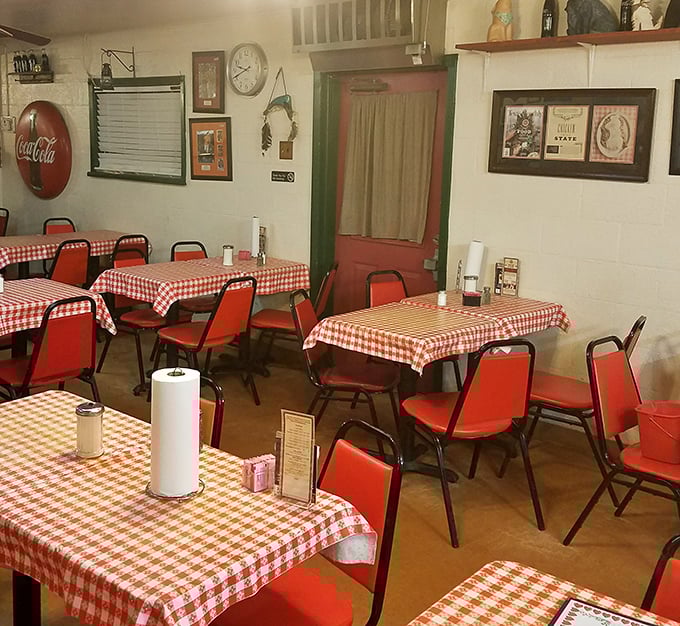 Another dining room view where every red chair has hosted generations of satisfied diners. These walls have heard countless "pass the gravy" requests.