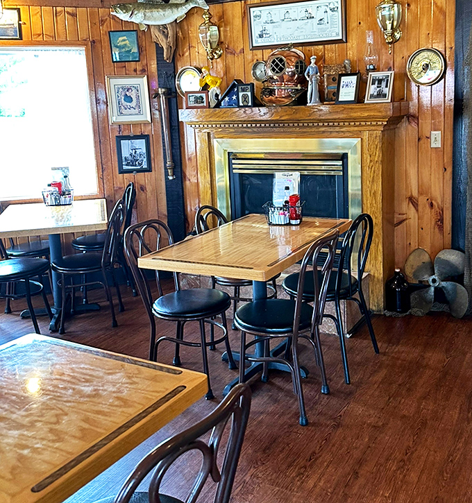 The dining room's nautical charm and fireplace create the cozy atmosphere of a seaside cottage&mdash;if that cottage happened to serve exceptional seafood.