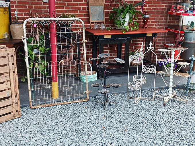 The outdoor garden section offers rustic gates and plant stands that whisper, "Your patio could look this charmingly weathered too."