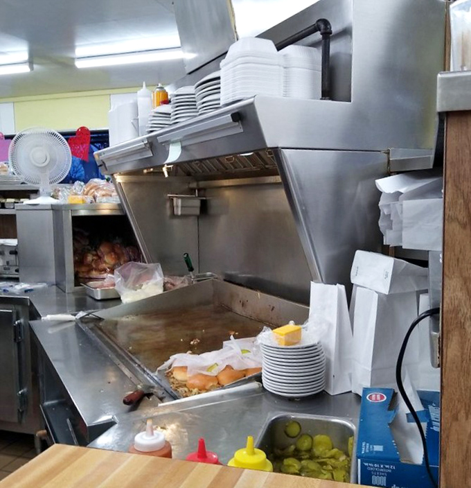 The beating heart of Bates&mdash;a well-seasoned flat-top grill where burger magic happens. No fancy equipment, just decades of know-how.