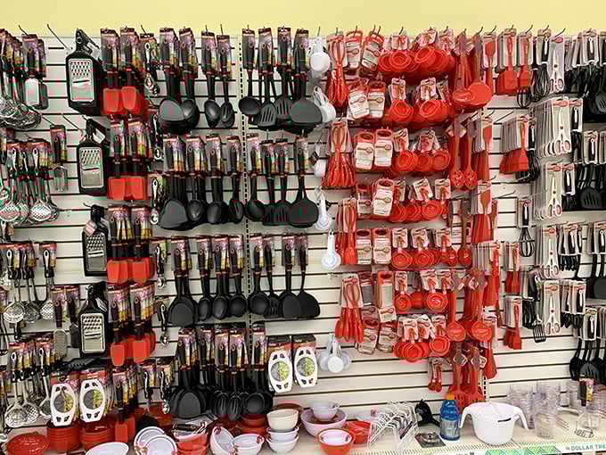 Kitchen tool paradise where spatulas, graters and whisks hang like culinary jewelry, waiting to transform humble kitchens.