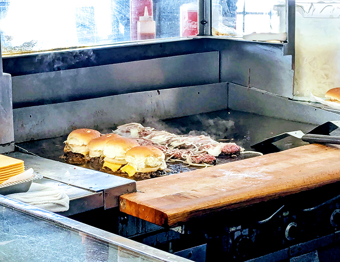 Where the magic happens&mdash;burgers sizzling on the flat-top, cheese melting into submission. This grill has more stories than most people.