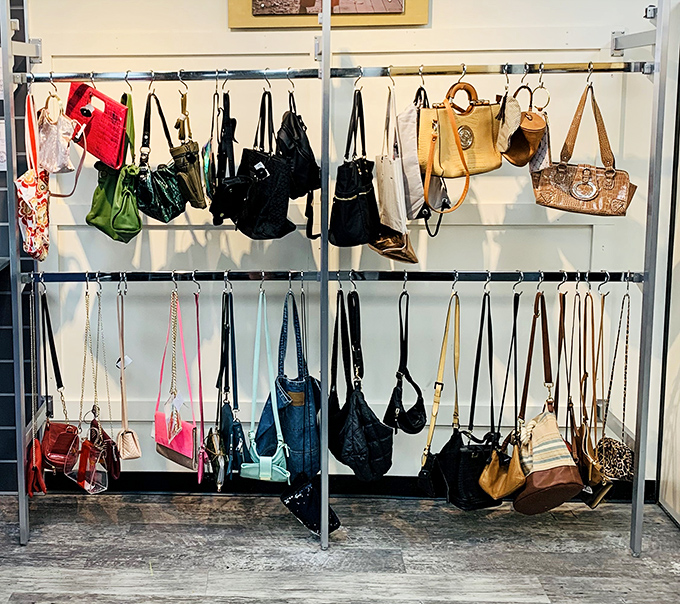 Handbag heaven! Designer purses hang like fashionable fruit, ripe for the picking at prices that won't make your credit card weep.