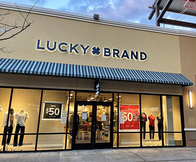 Lucky Brand's evening glow and prominent 50% off signs create the perfect storm of denim temptation for jeans aficionados on a budget.