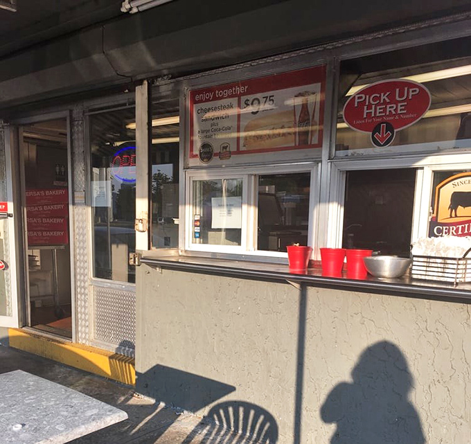 The pickup window at Shank's &ndash; where sandwich dreams come true and diet plans go to die. Worth every calorie!