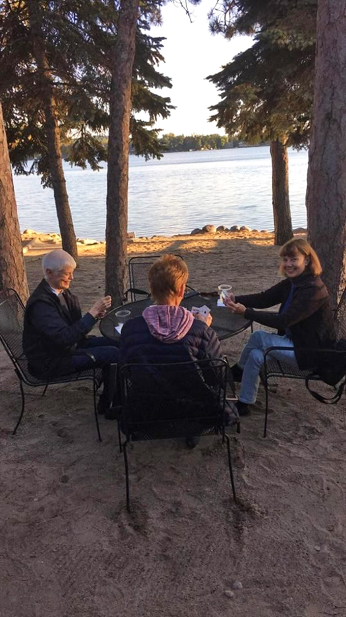 The sandy beach seating area transforms happy hour into something that actually lives up to its name.