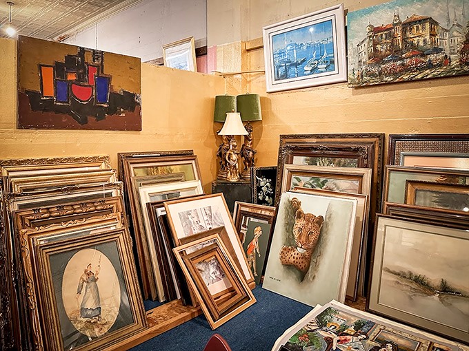 Leaning towers of framed artwork create an impromptu gallery where someone's discarded d&eacute;cor becomes your next conversation piece.