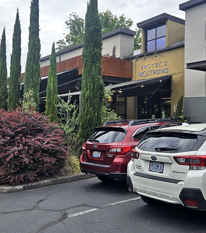 Even the parking area feels like Italy with towering cypress trees and Mediterranean landscaping. Your Roman holiday begins the moment you arrive.