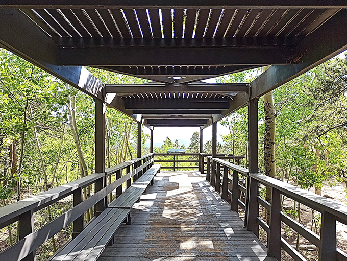 This covered walkway isn't just practical&mdash;it's the runway where hikers strut their Gore-Tex and walking sticks with wilderness flair.