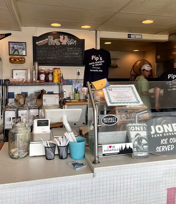 The ordering station: where dreams are voiced, hunger is confessed, and the staff transforms simple requests into handheld happiness.