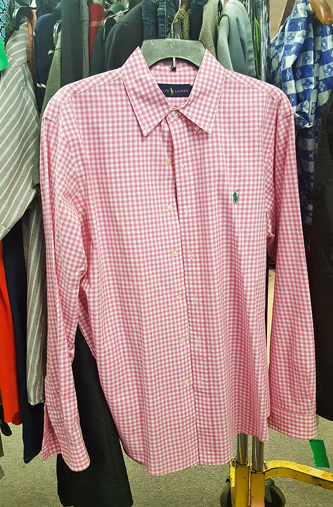 Designer discovery! A Ralph Lauren button-down hanging quietly among everyday finds&mdash;the thrill of the hunt in pink gingham form.