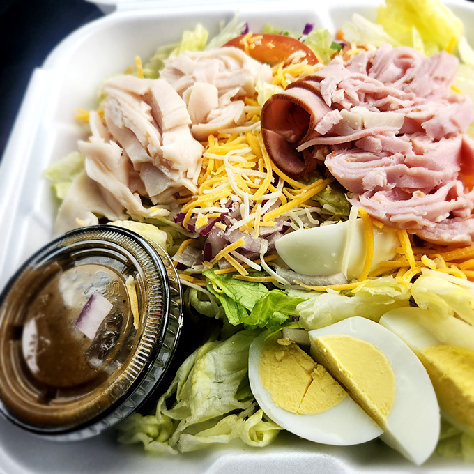 A chef's salad that defies the sad-lunch-option stereotype, loaded with protein and fresh ingredients that make eating vegetables feel like a reward, not punishment.