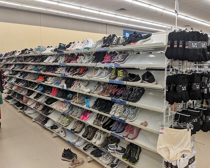 Athletic shoes line up like they're ready for a secondhand marathon, proving fitness doesn't require first-hand prices.