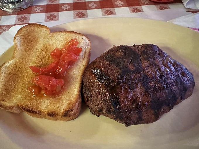 Garlic toast and a perfectly seared steak&mdash;a simple combination that proves you don't need culinary gymnastics to reach food nirvana.
