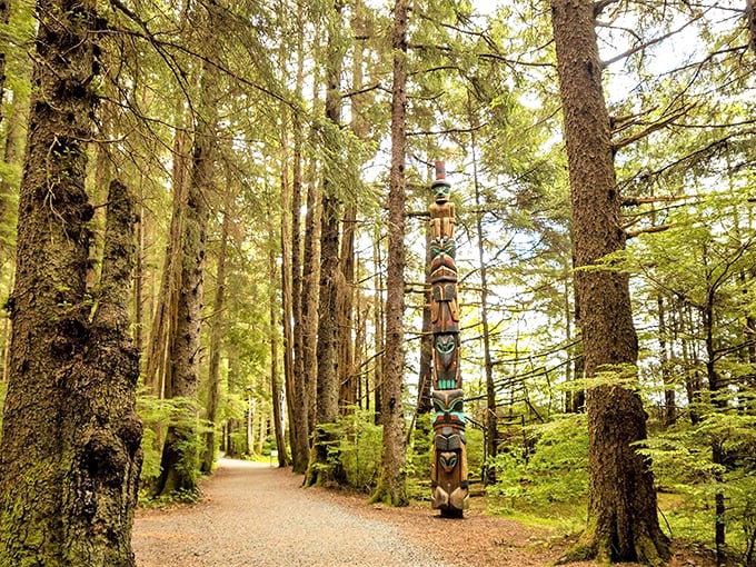 Ancient totems stand watch in moss-draped forests, silent storytellers carved by hands that understood this land long before it appeared on any map.