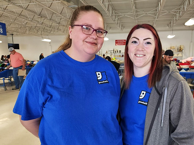 The unsung heroes of the treasure hunt experience, Goodwill staff keep the blue bins flowing and the bargains coming with cheerful efficiency.