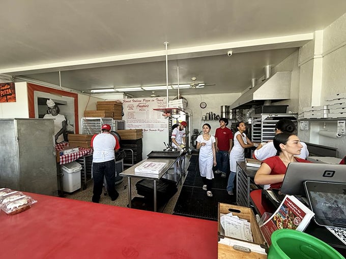 The kitchen crew moves with the synchronized precision of Olympic swimmers&mdash;a choreographed dance that results in pizza perfection.