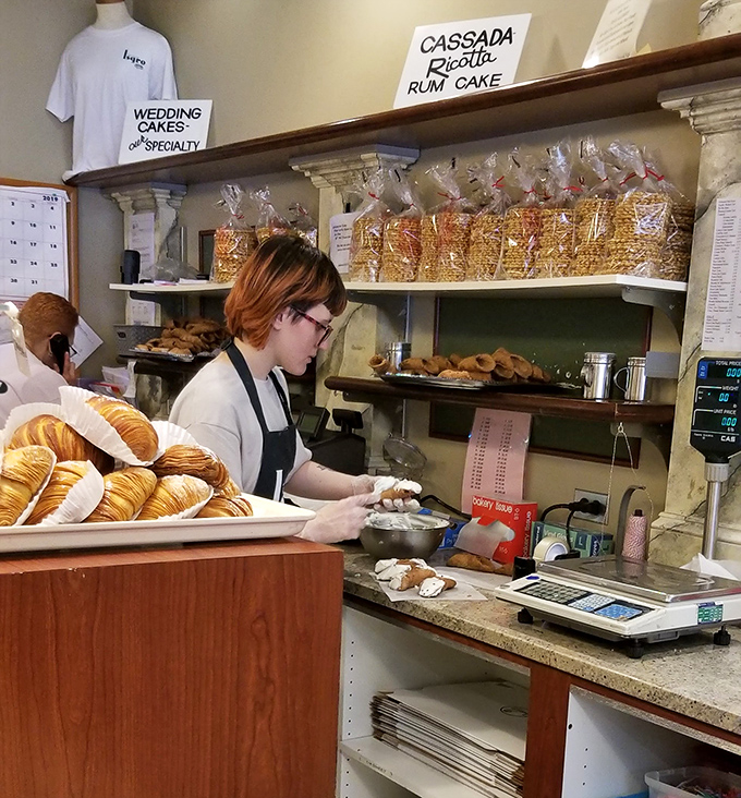 Behind the scenes, the magic happens. Wedding cakes may be their specialty, but every day feels like a celebration when you're crafting joy.