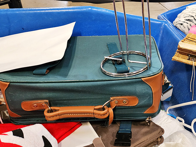 A vintage suitcase with stories to tell. Who traveled with this companion, and where will its next journey take it?